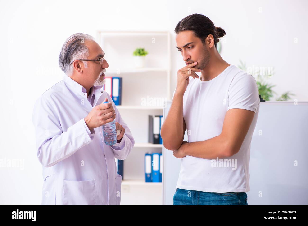 The doctor dietician giving advices to fat overweight patient Stock ...