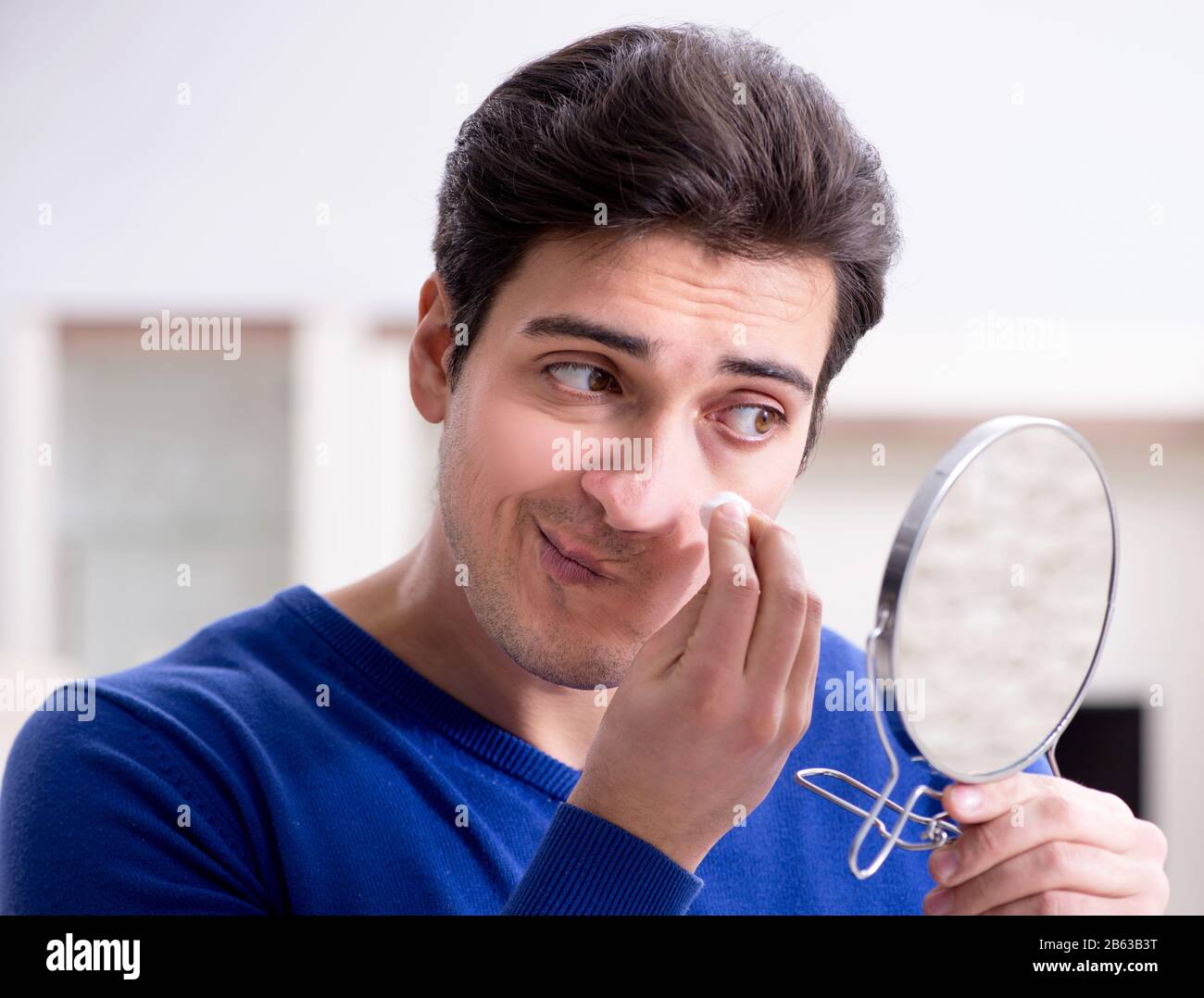 The man panicking because of pimples on the skin Stock Photo - Alamy