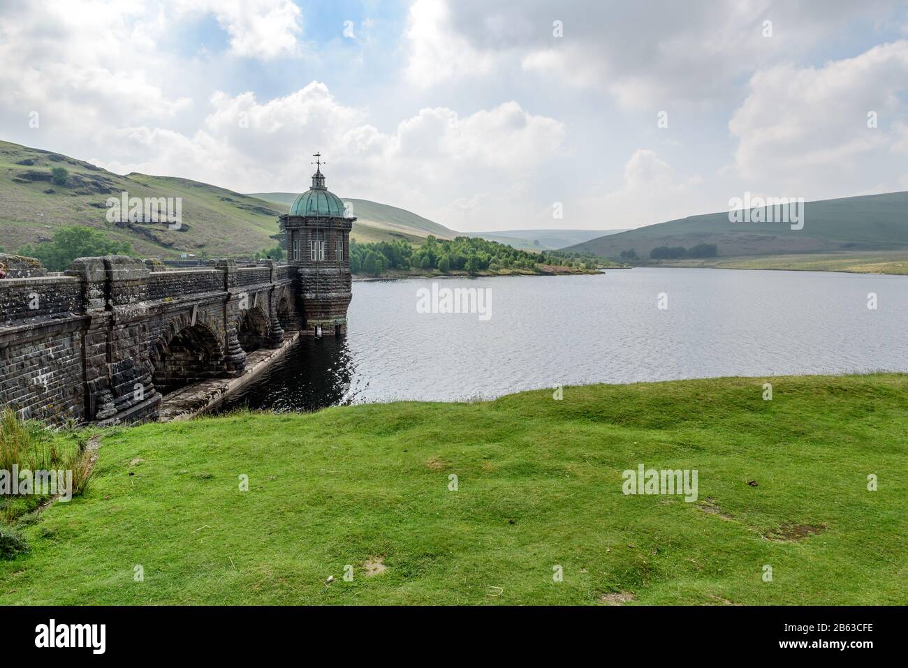 Craig Goch Dam in the Elan Valley, Wales, UK. Dam is shown on the left ...