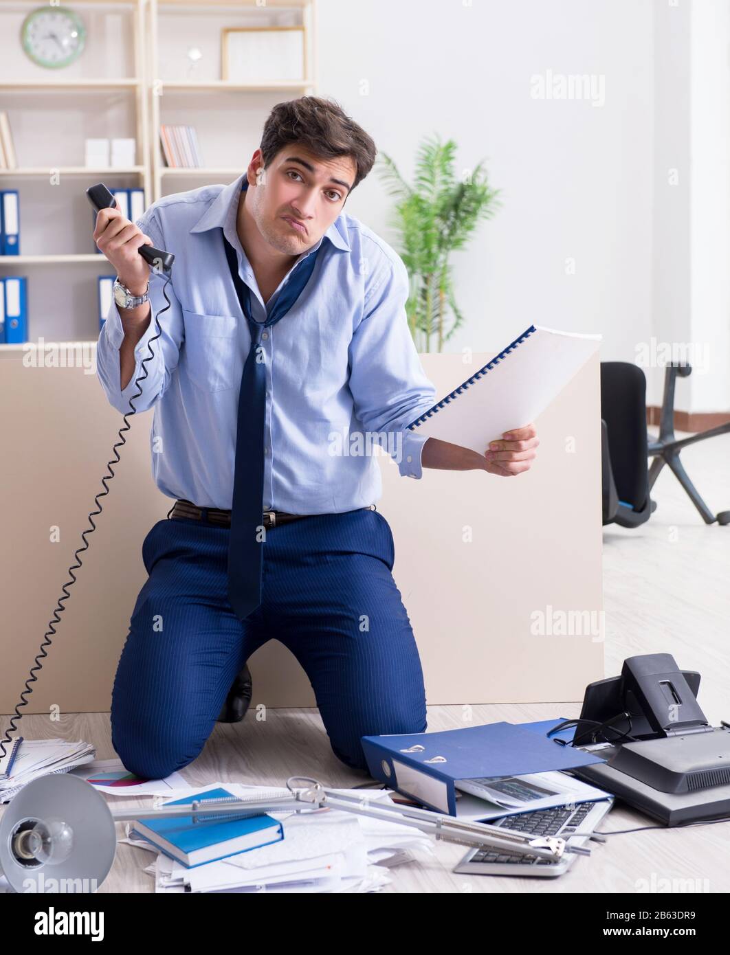 The businessman frustrated at many telephone calls Stock Photo - Alamy