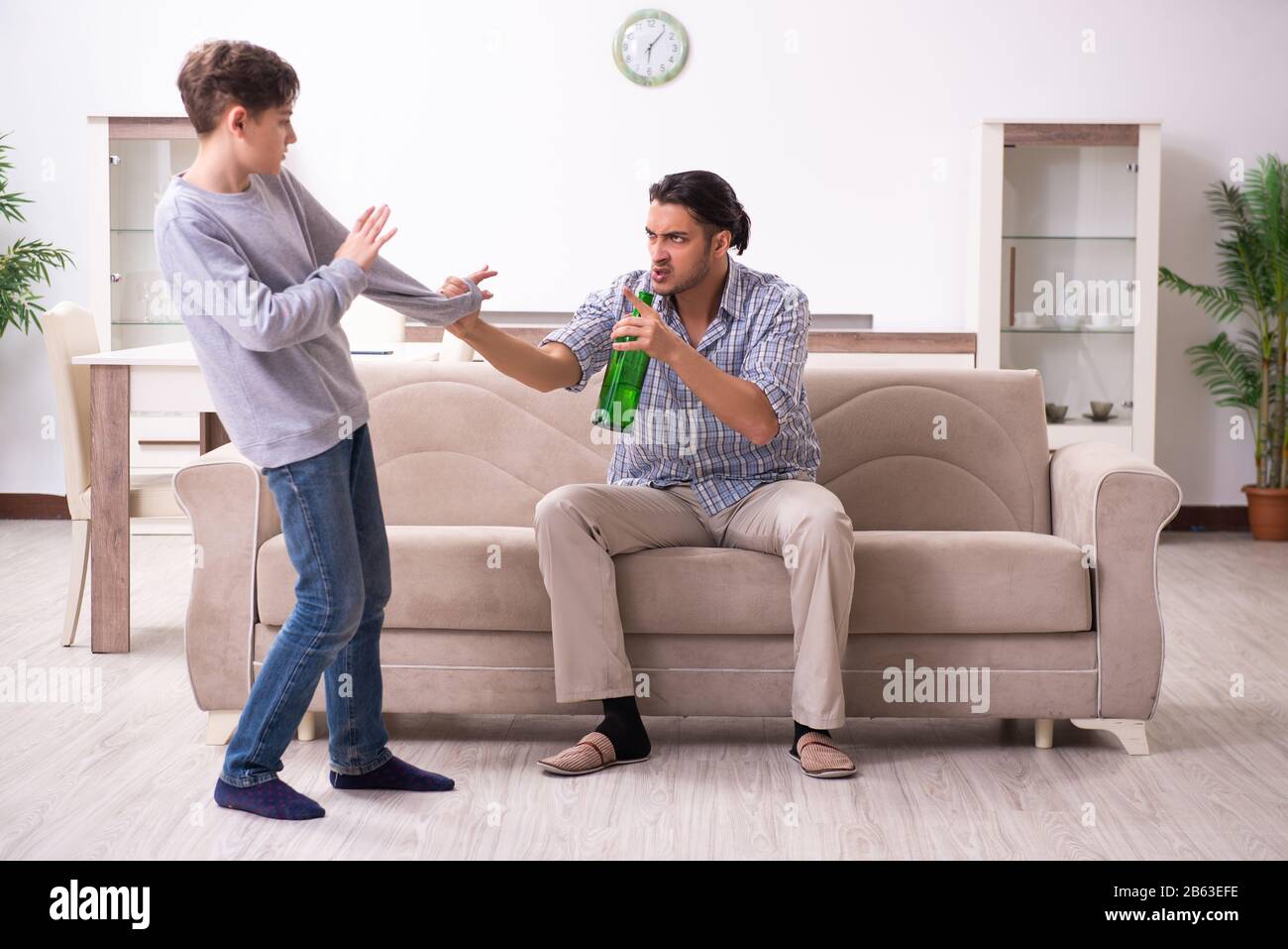 The drunk father and his son Stock Photo - Alamy