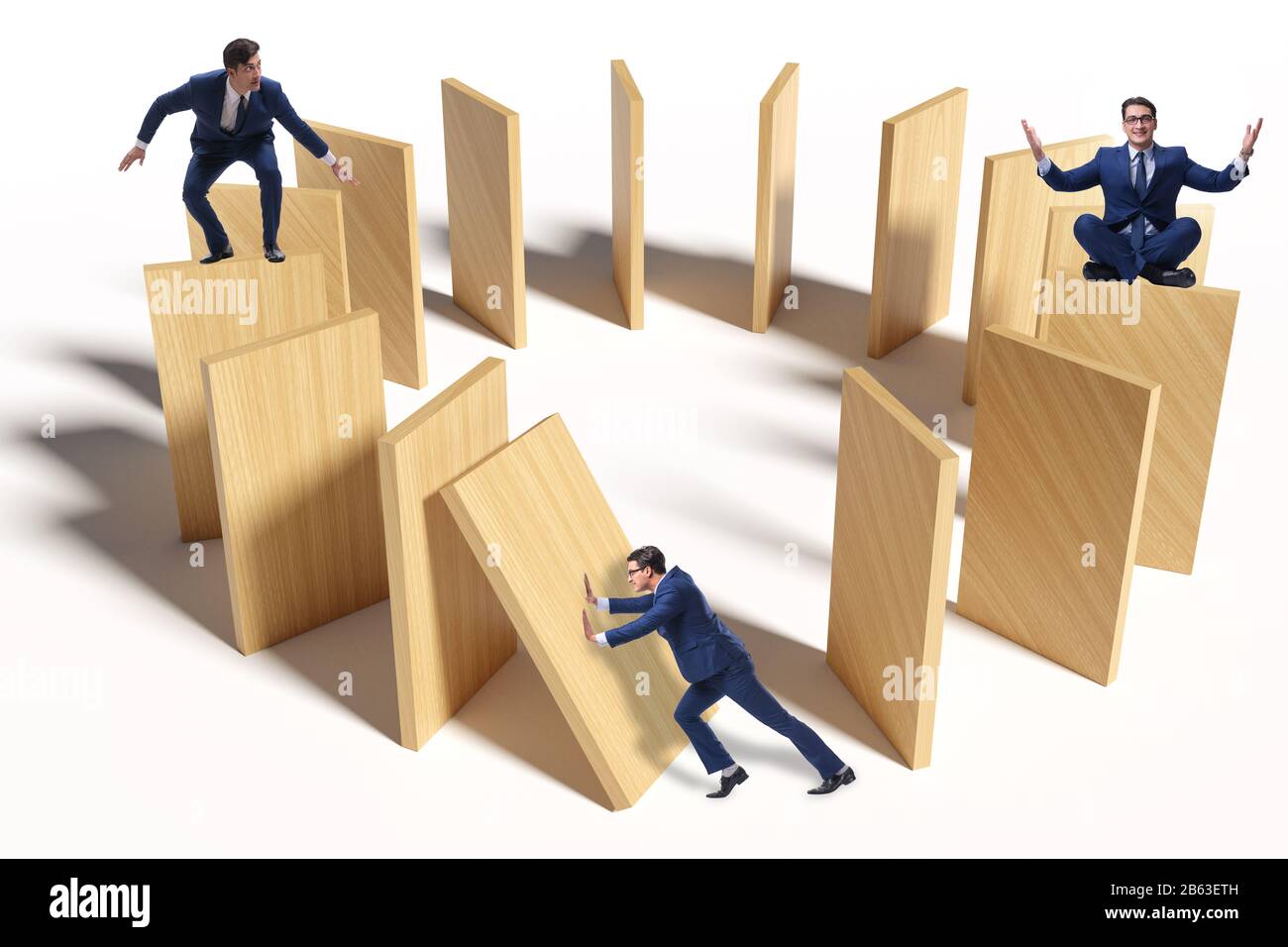Domino effect and the competition concept Stock Photo - Alamy