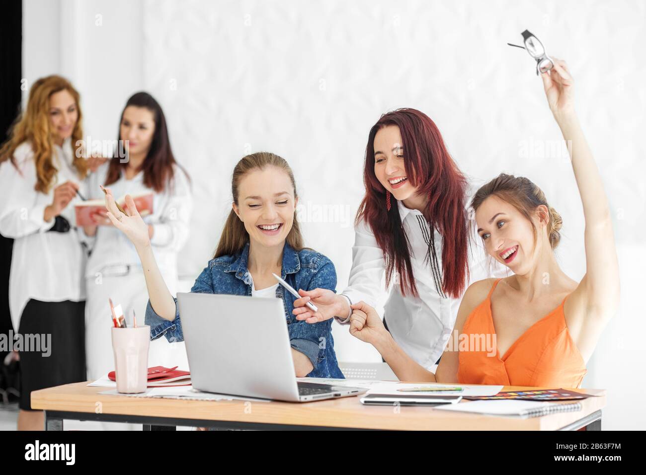 A group of happy people work in the office. Smile. Successful business ...