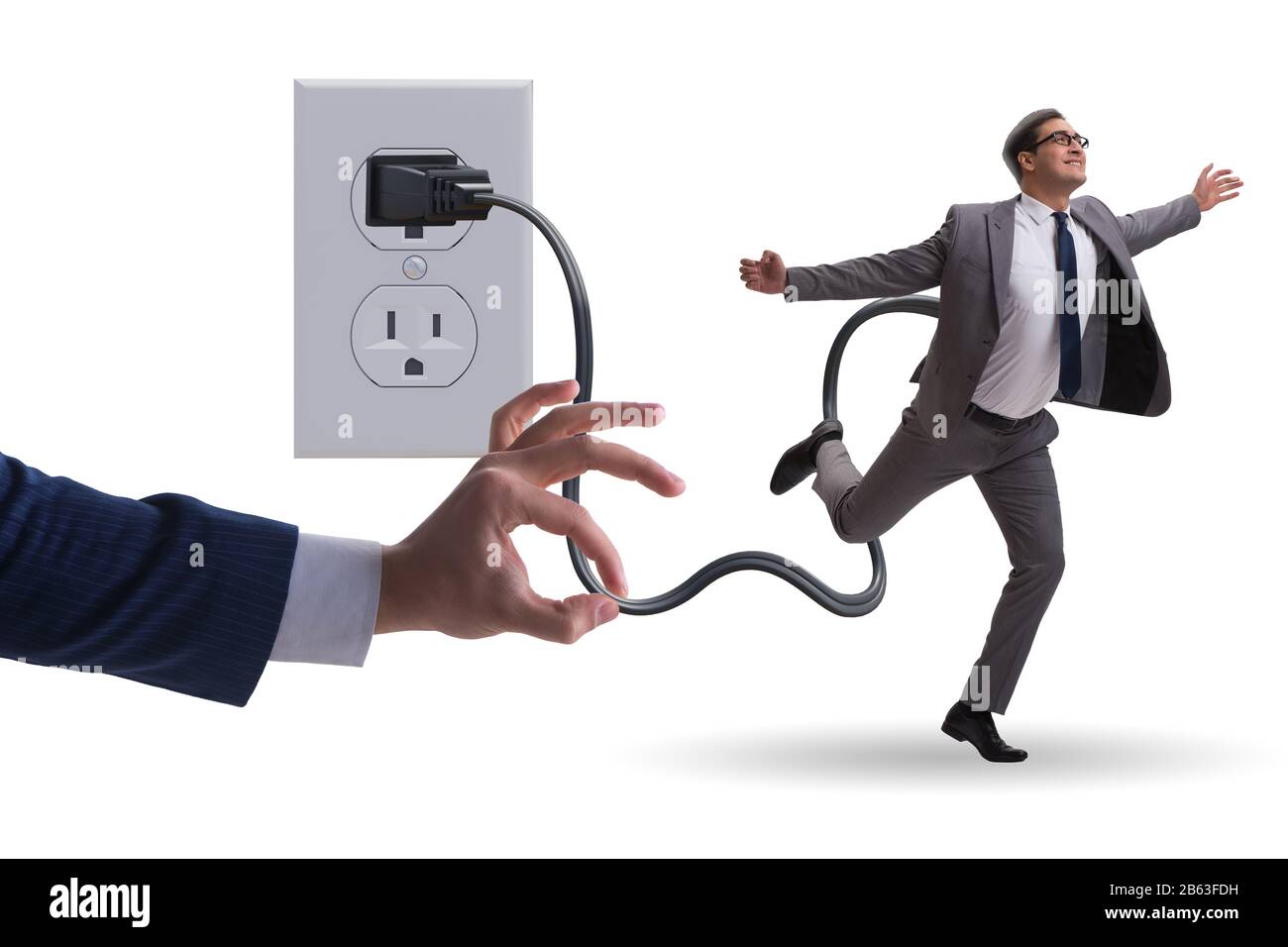 Businessman being powered by electricity and plug Stock Photo - Alamy