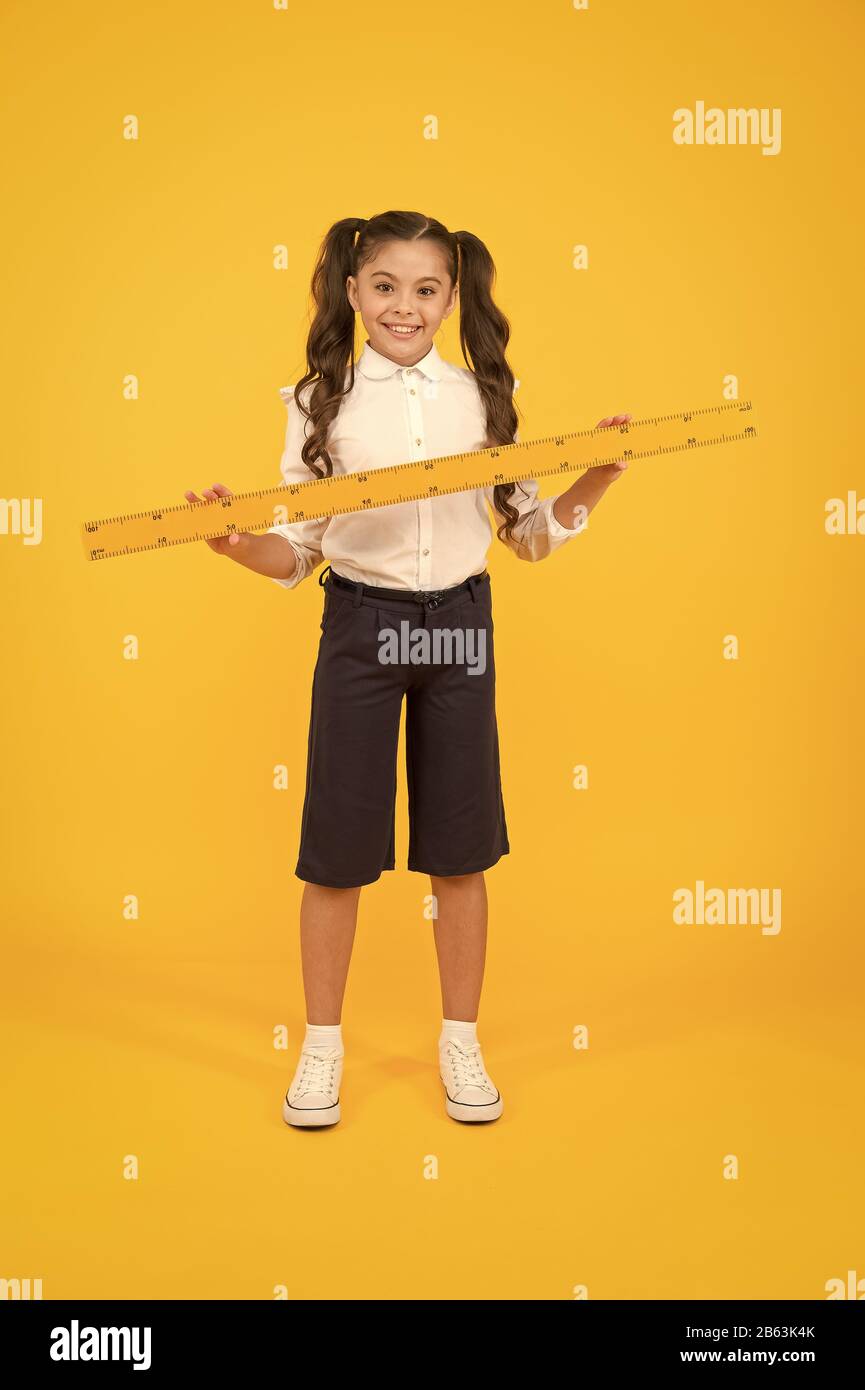 Education and school concept. Sizing and measuring. Studying is fun ...