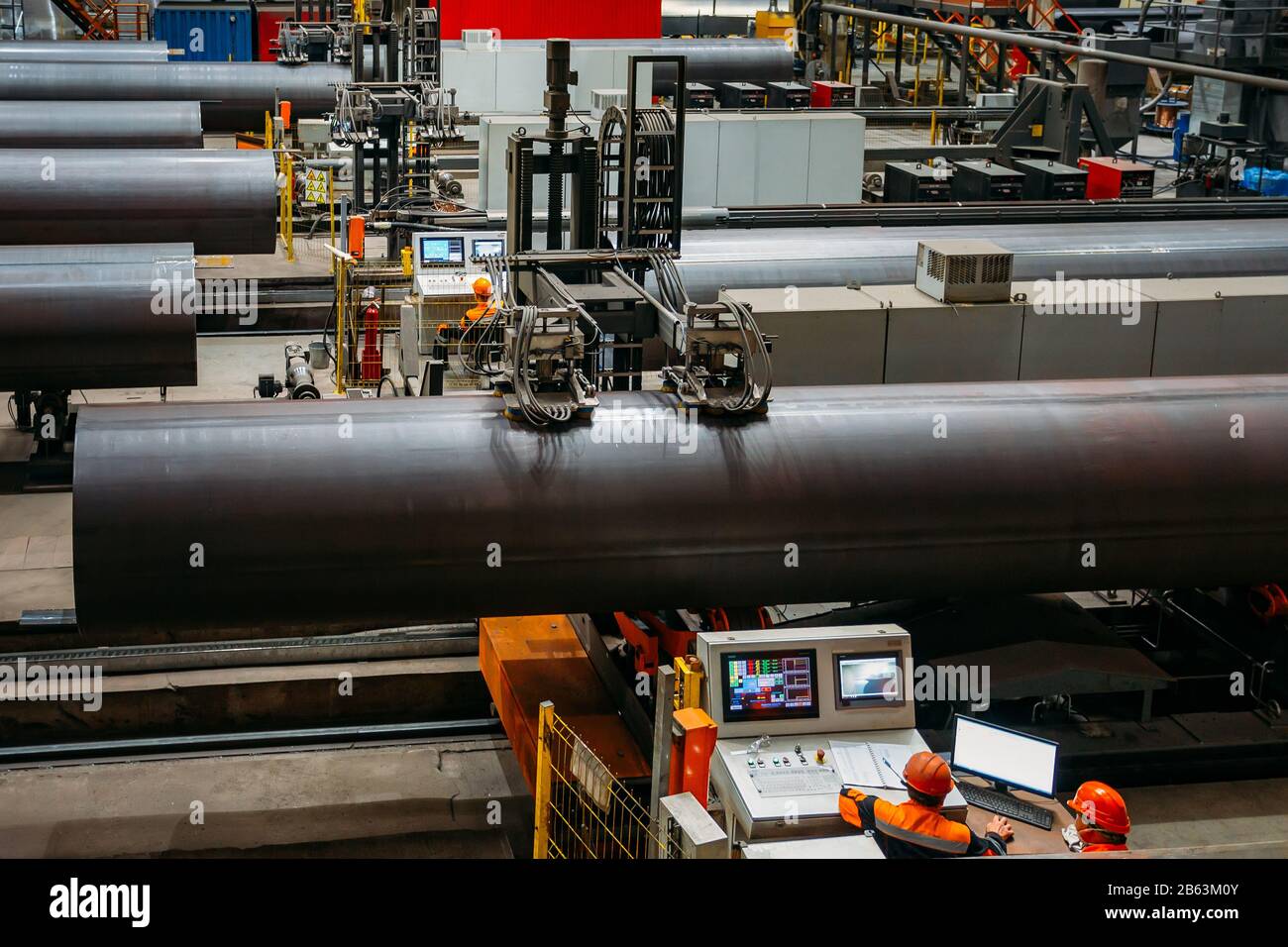 Steel pipe internal seam welding by longitudinal tack welding machine ...