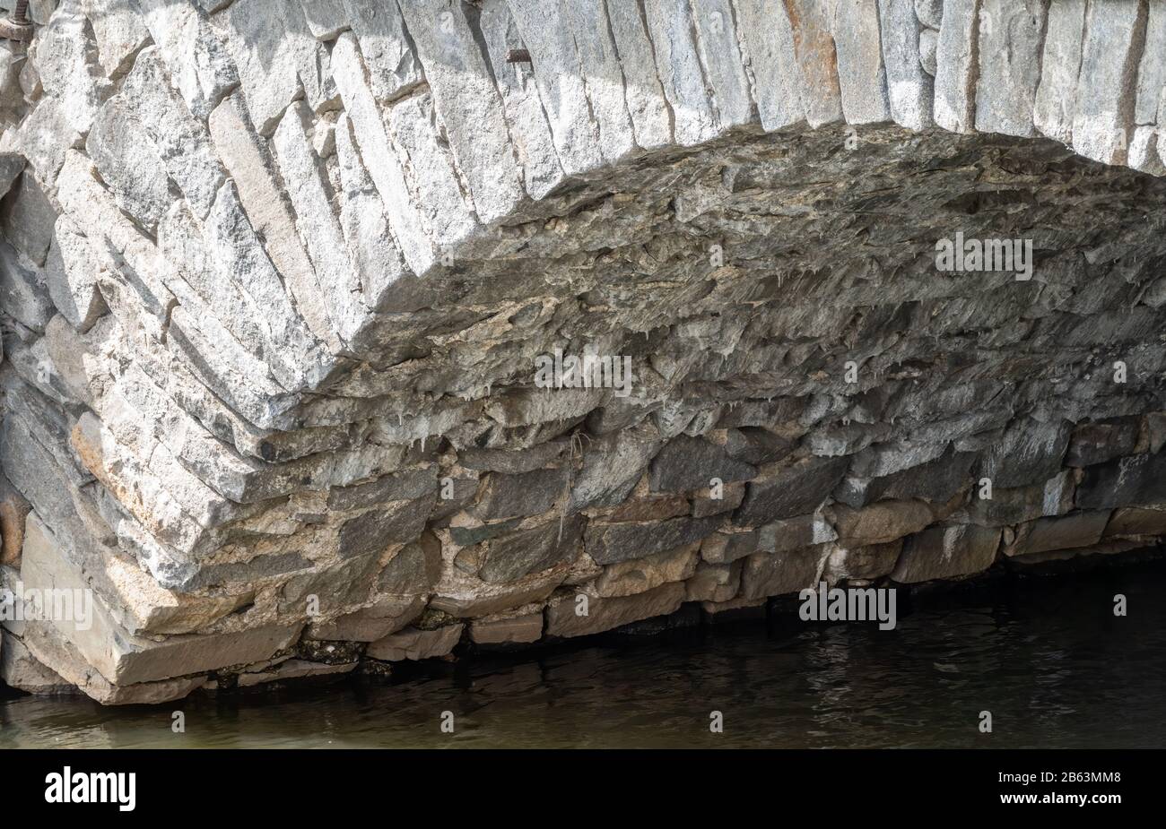 Stonework of a bridge pylon of a 19th century brick bridge. Old stone ...