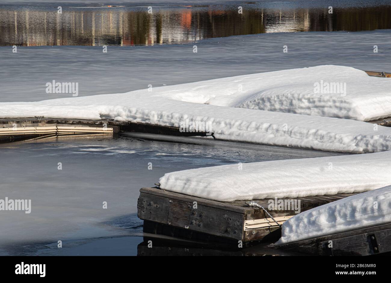 Winter at the snow covered waterfront docks in Huntsville Muskoka Stock ...