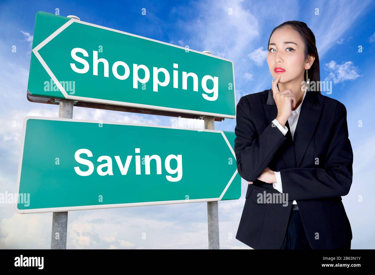 Spend save road sign with business woman thinking choice direction ...