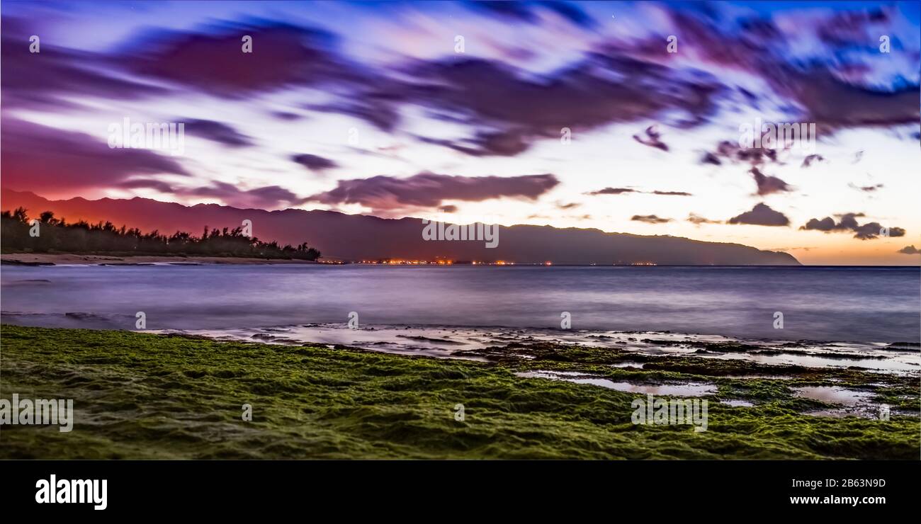 Sunset from Kahawai Beach looking south over Waimea Point and Laniakea ...