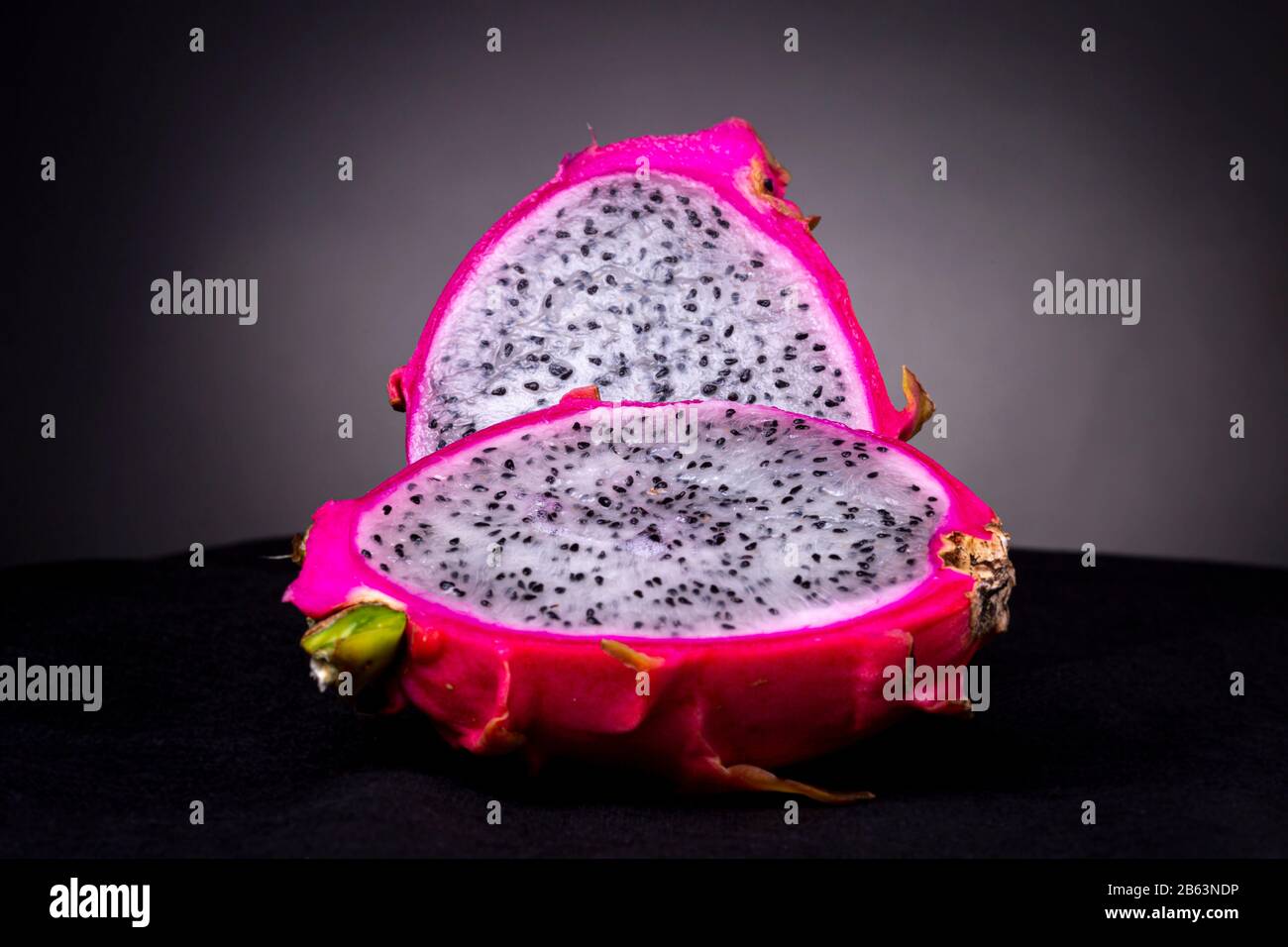 White pulp with black seeds of the white-fleshed Pitaya or Dragon fruit ...