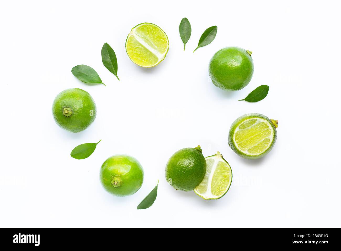 Composition with fresh limes on white background. Copy space Stock ...