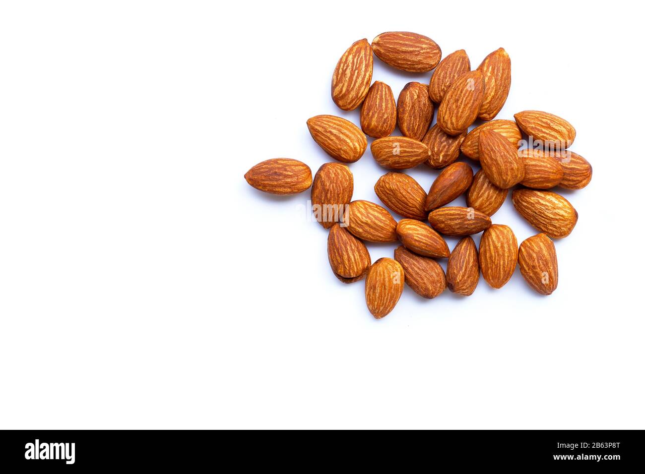 Almonds isolated on white background Stock Photo - Alamy