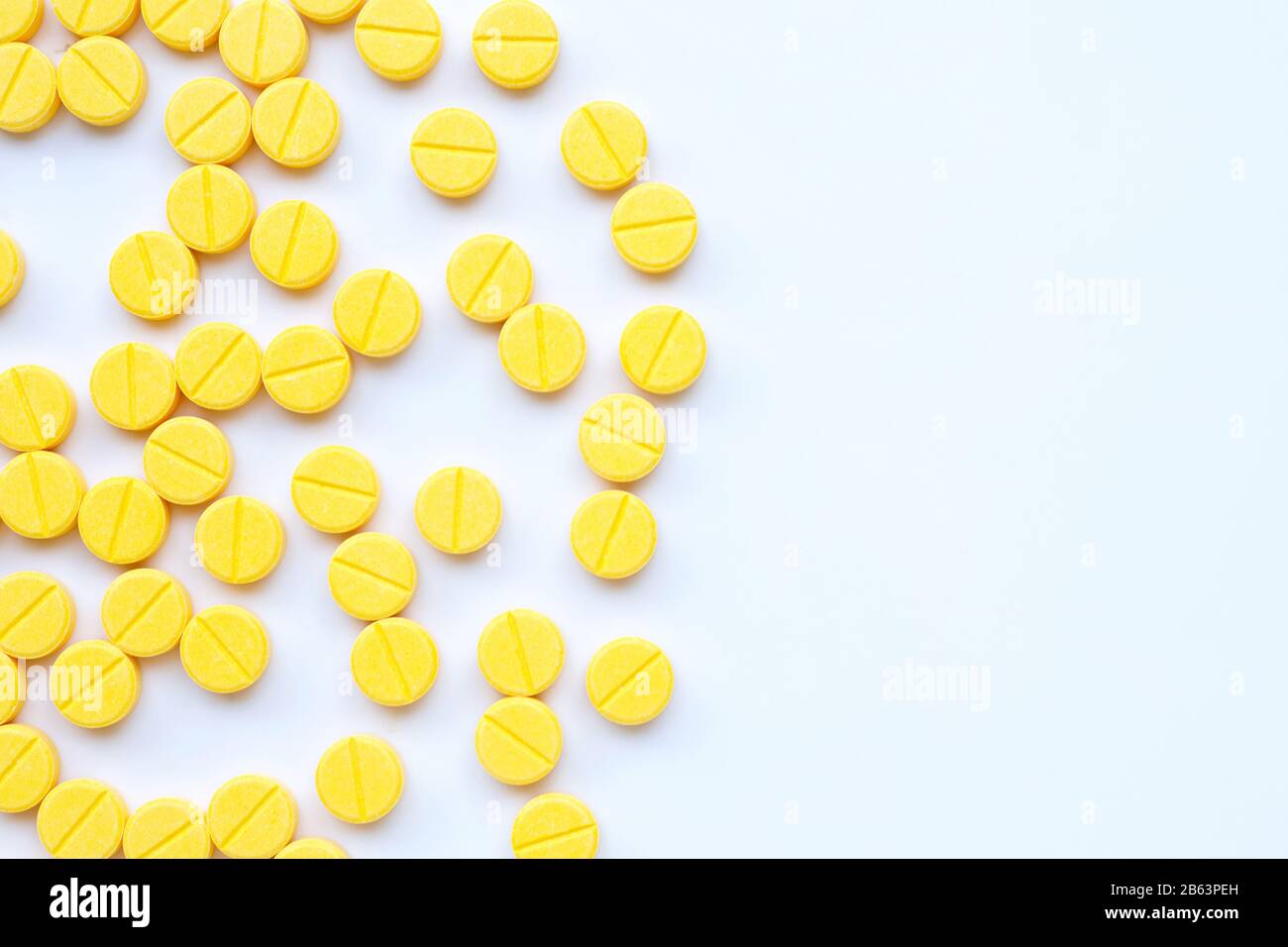 Yellow tablets of Paracetamol on white background. Copy space Stock ...