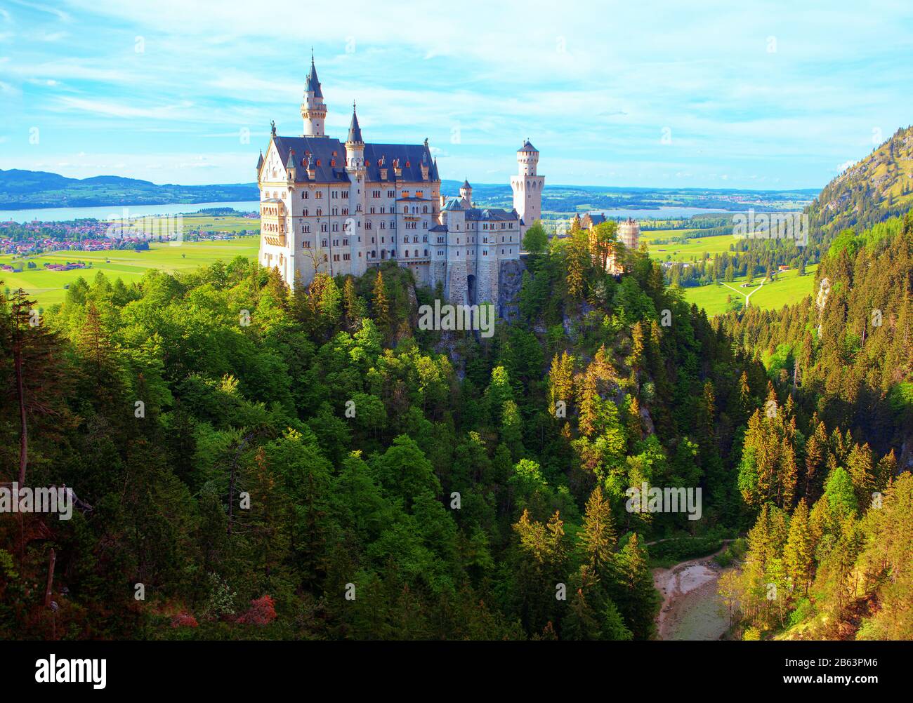 famous bavarian Neuschwanstein Castle situated on the mountains Stock ...