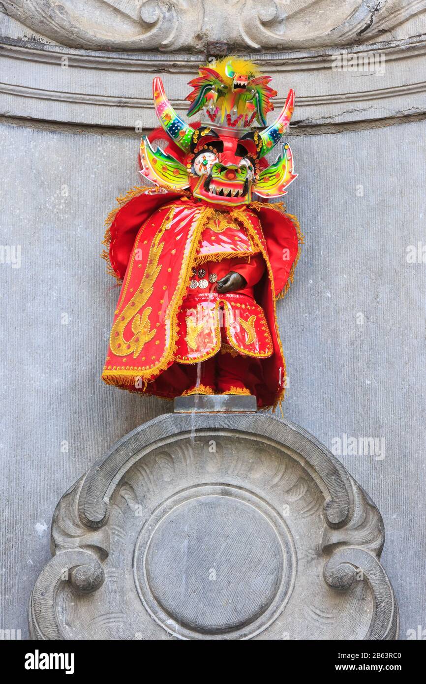 Statue of Manneken Pis dressed like a Bolivia Diablada (devil) from the ...