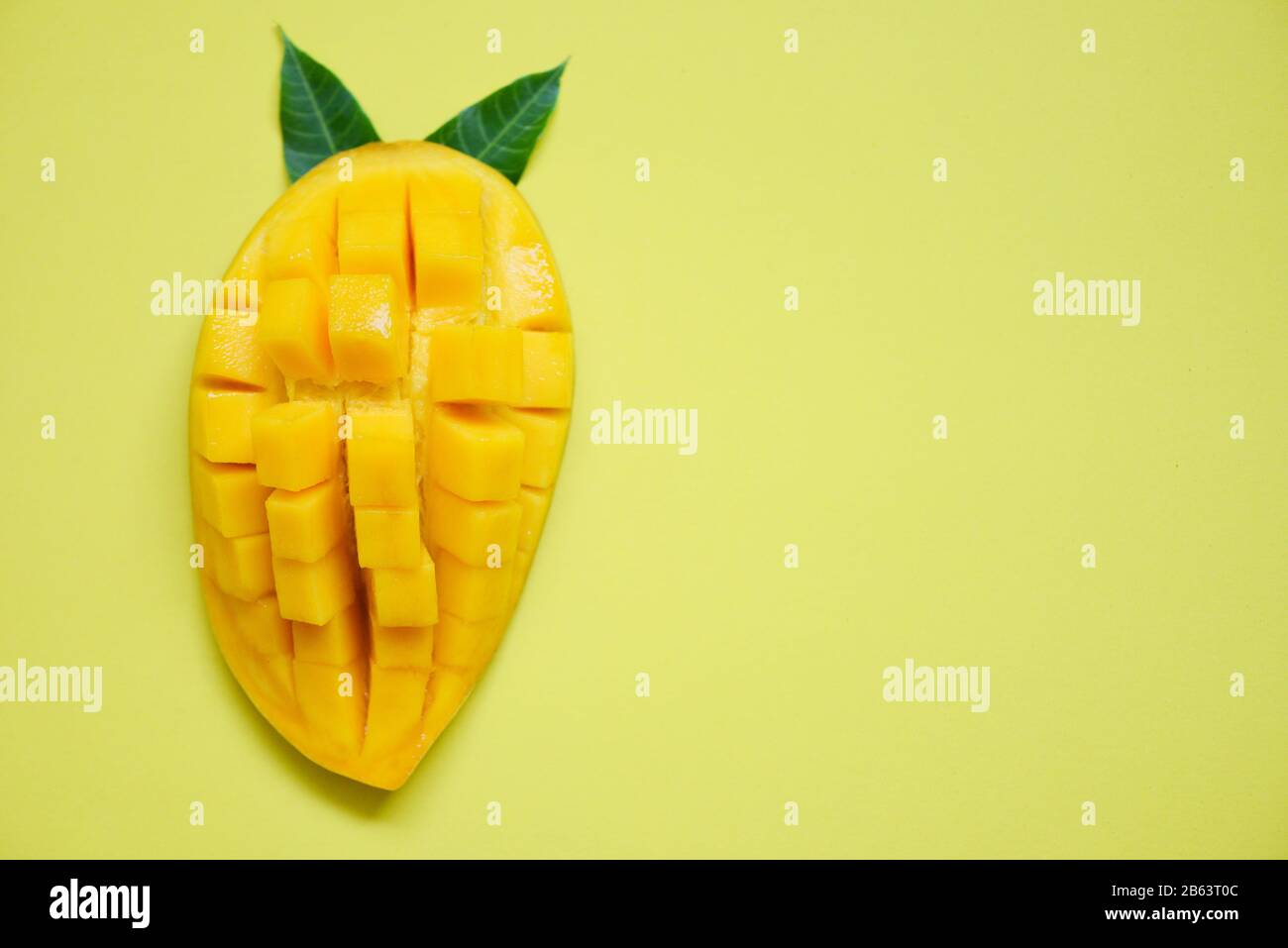 Cut mango from tree hi-res stock photography and images - Alamy
