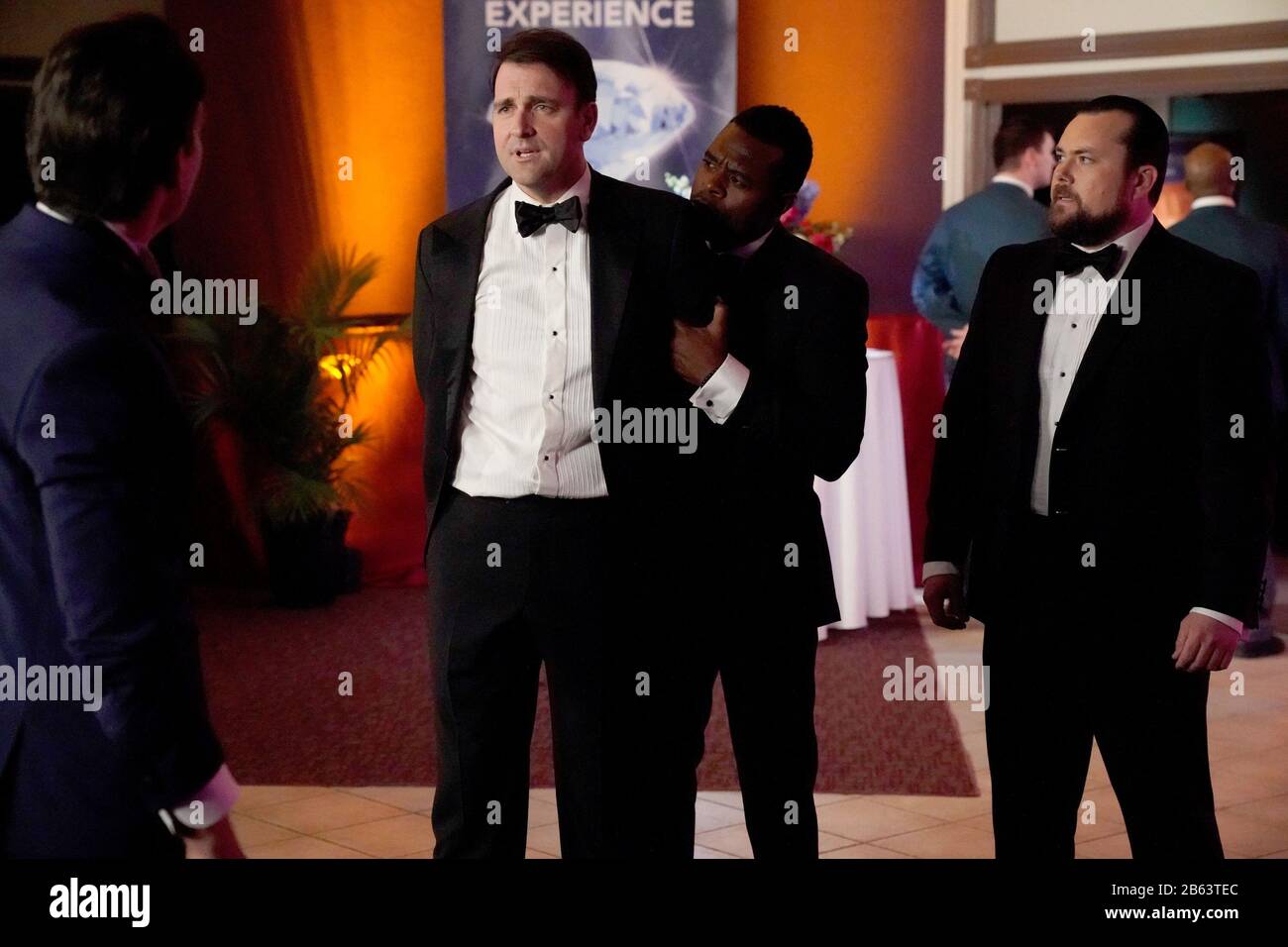 CARTER, from left: Jerry O'Connell (back to camera), Brandon Firla ...