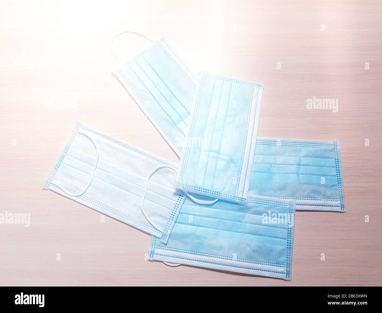 Medical masks on table pile hi-res stock photography and images - Alamy