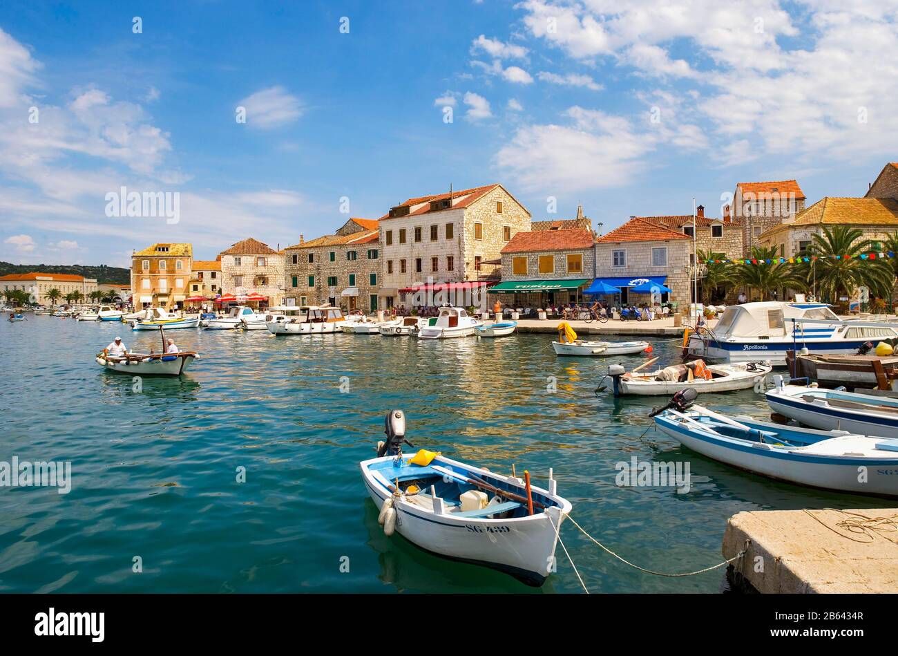 Promenade with fishing boats in the port, Stari Grad, island of Hvar ...