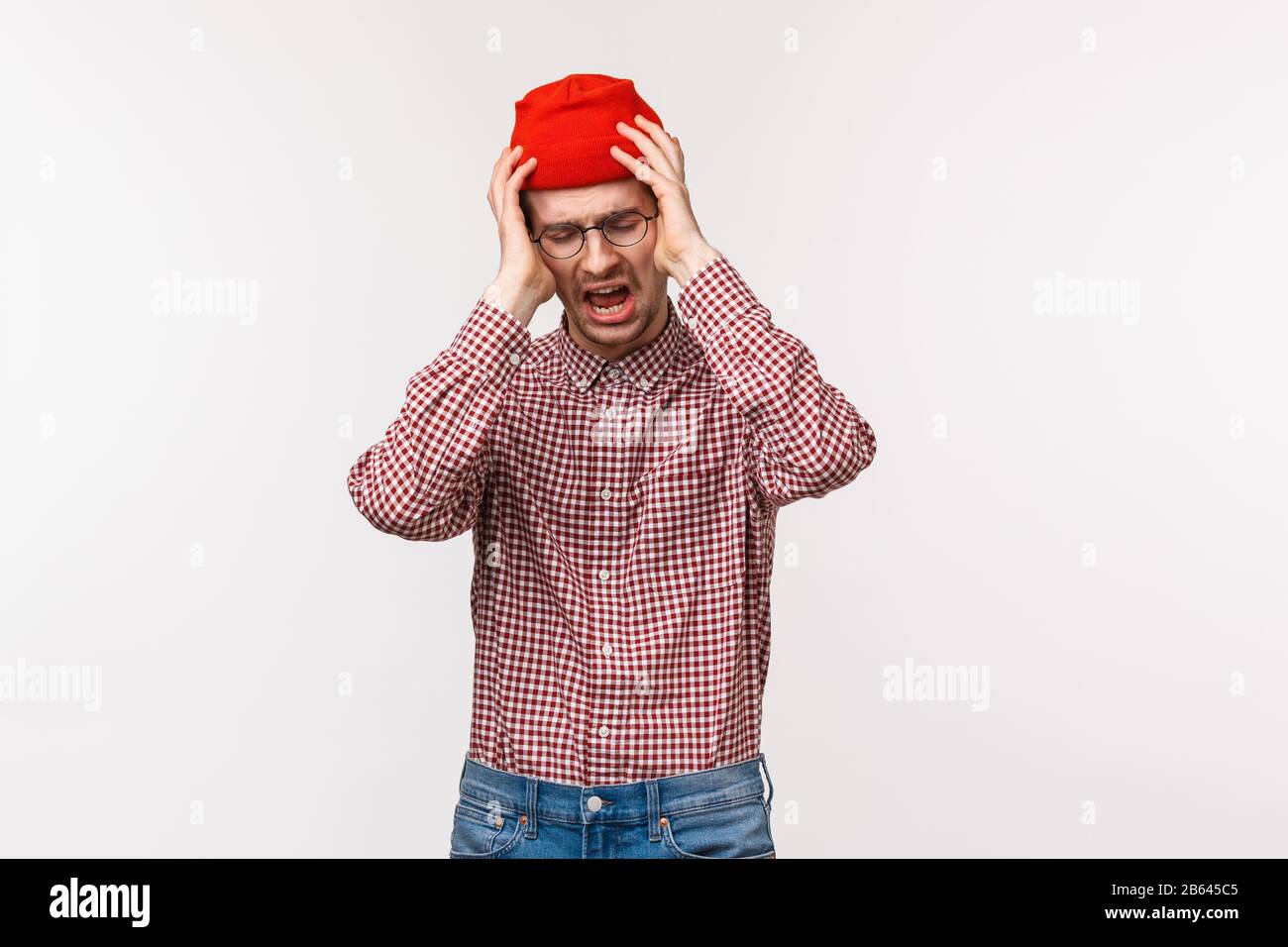 Sad beard young man facing hi-res stock photography and images - Alamy