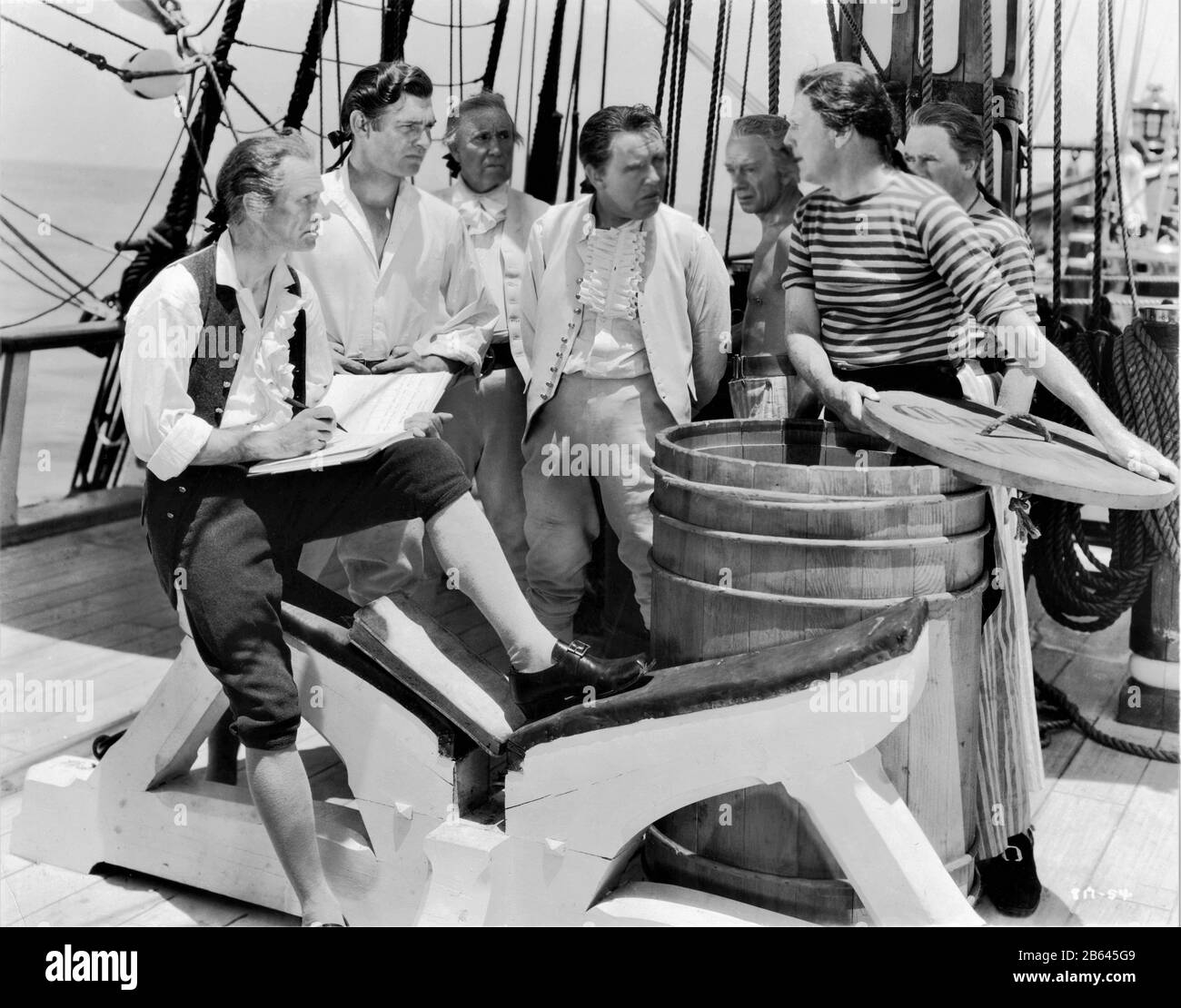 IAN WOLFE as Maggs CLARK GABLE as Fletcher Christian and CHARLES ...