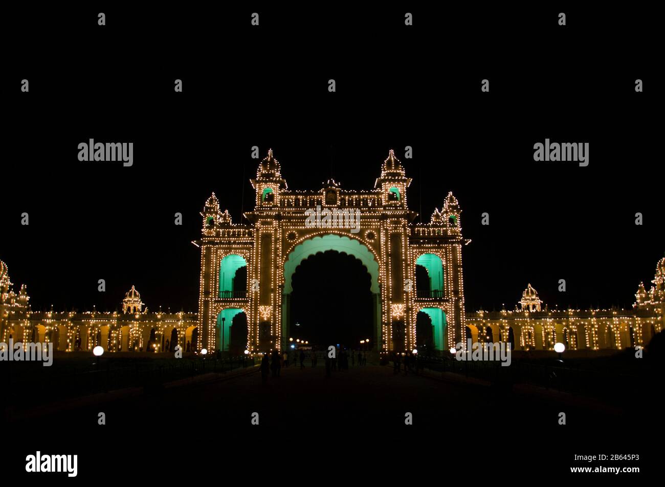 One of the entrance gate of the Mysore Palace at night, is a historical ...