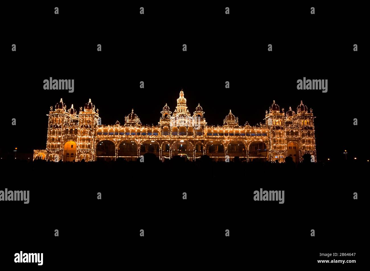 One of the entrance gate of the Mysore Palace at night, is a historical ...