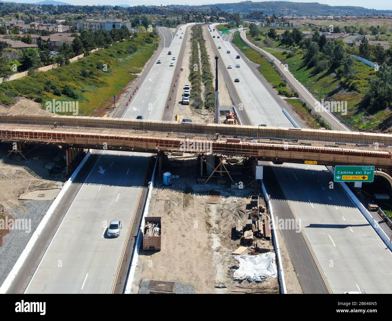 Aerial view of bridge construction crossing the highway, California ...