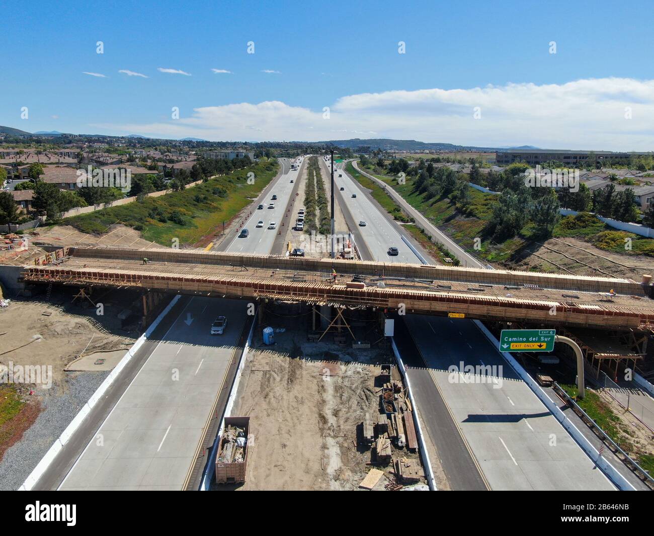 Aerial view of bridge construction crossing the highway, California ...