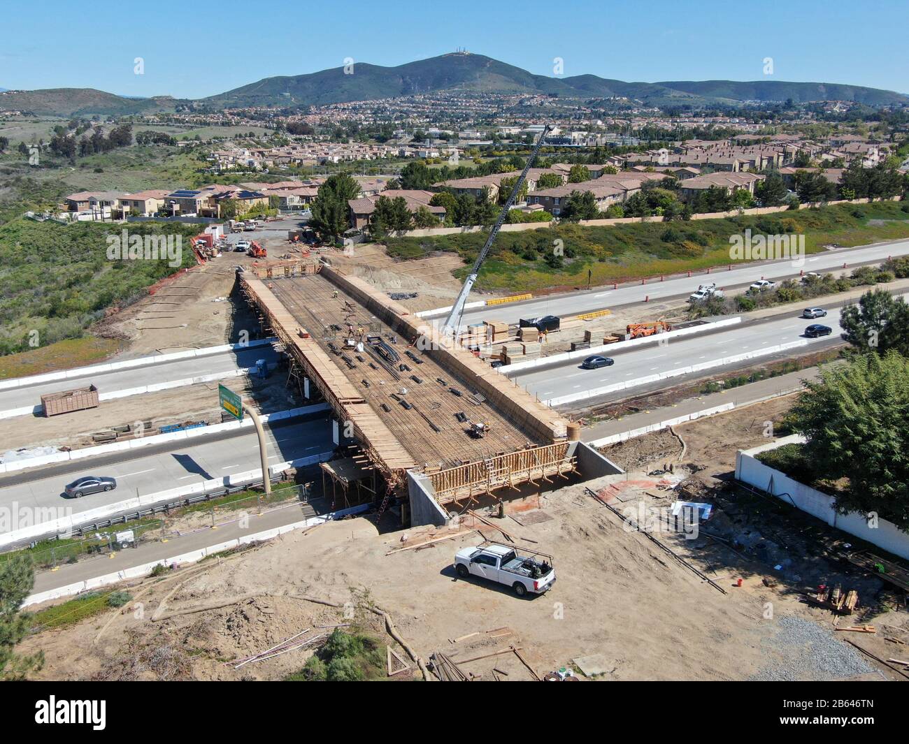 Aerial view of bridge construction crossing the highway, California ...