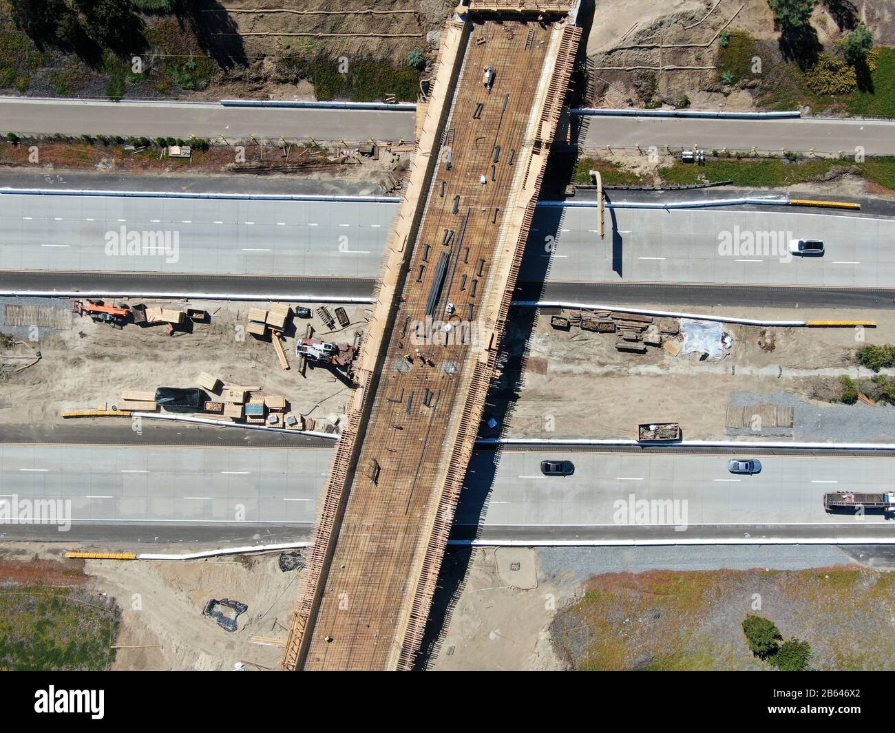 Aerial view of bridge construction crossing the highway, California ...