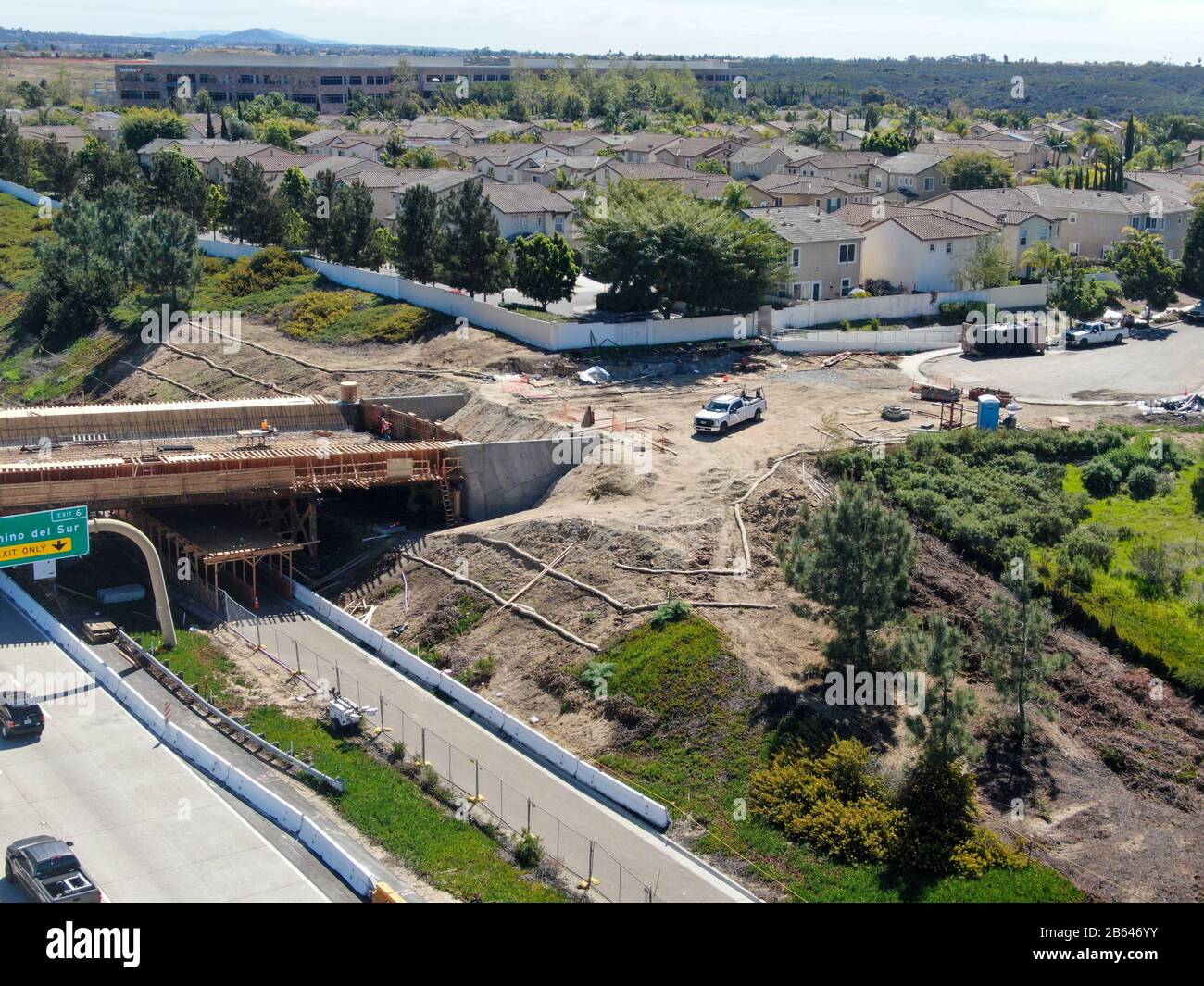 Aerial view of bridge construction crossing the highway, California ...