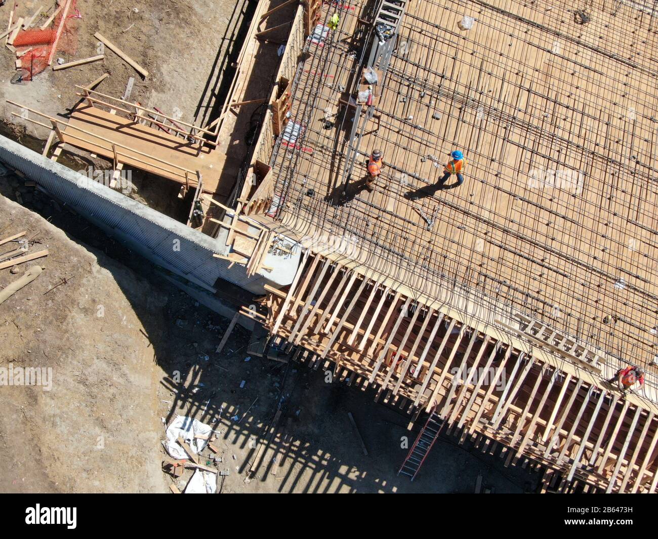 Aerial view of bridge construction crossing the highway, California ...