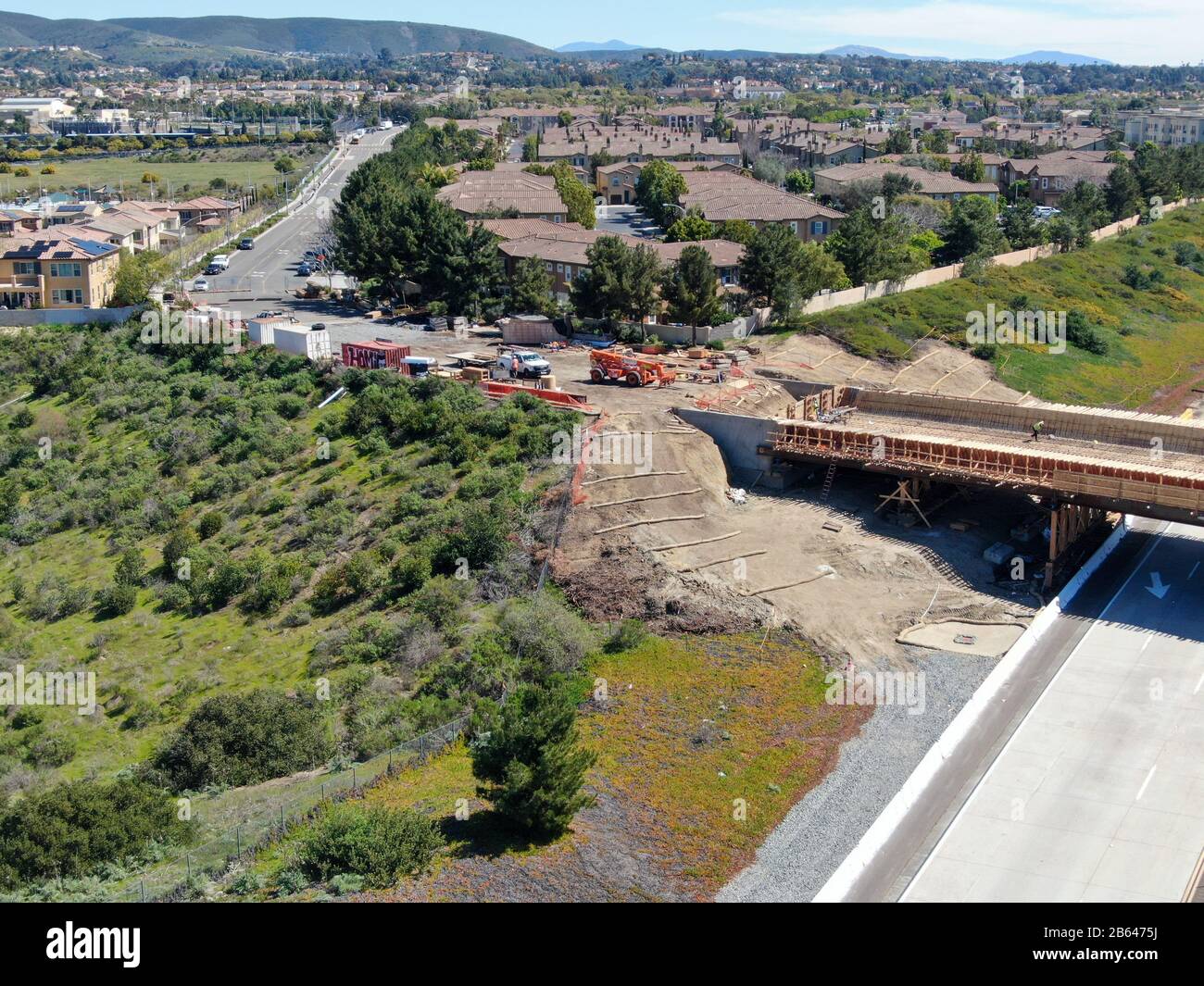 Aerial view of bridge construction crossing the highway, California ...