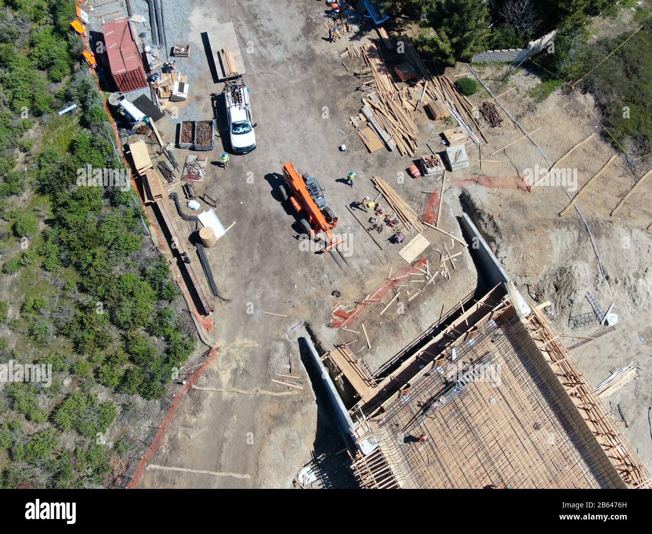 Aerial view of bridge construction crossing the highway, California ...