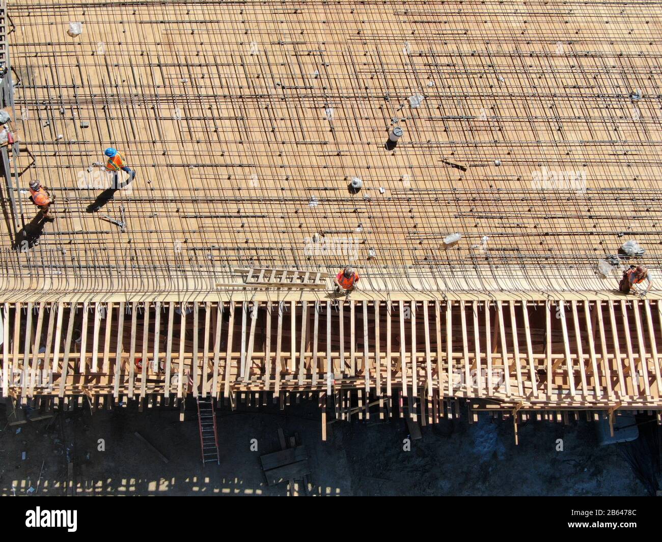 Aerial view of bridge construction crossing the highway, California ...