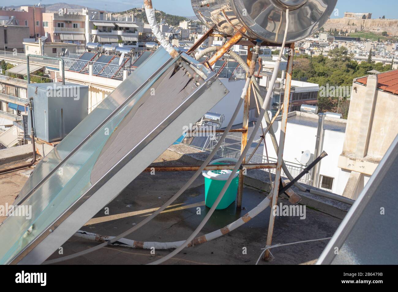 Broken solar panel with pipes and hoses Stock Photo - Alamy