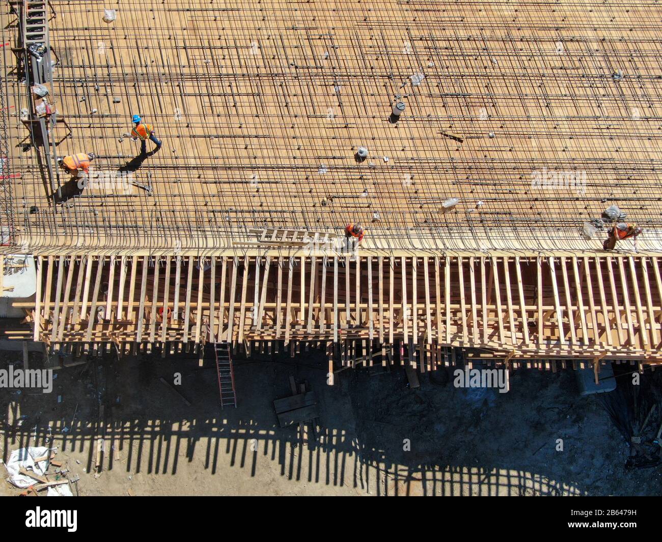 Aerial view of bridge construction crossing the highway, California ...
