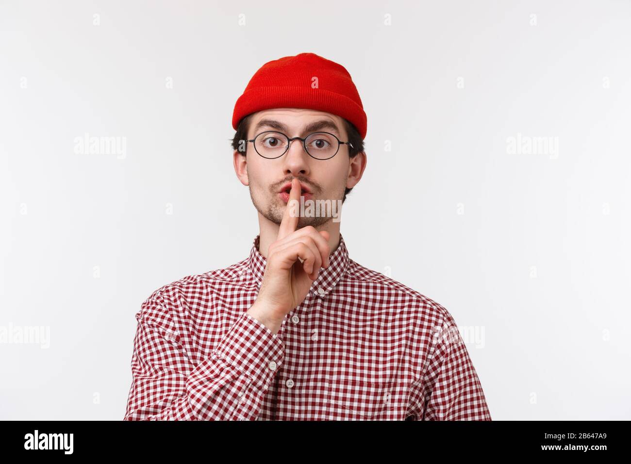 Facial expression shush silence hi-res stock photography and images - Alamy