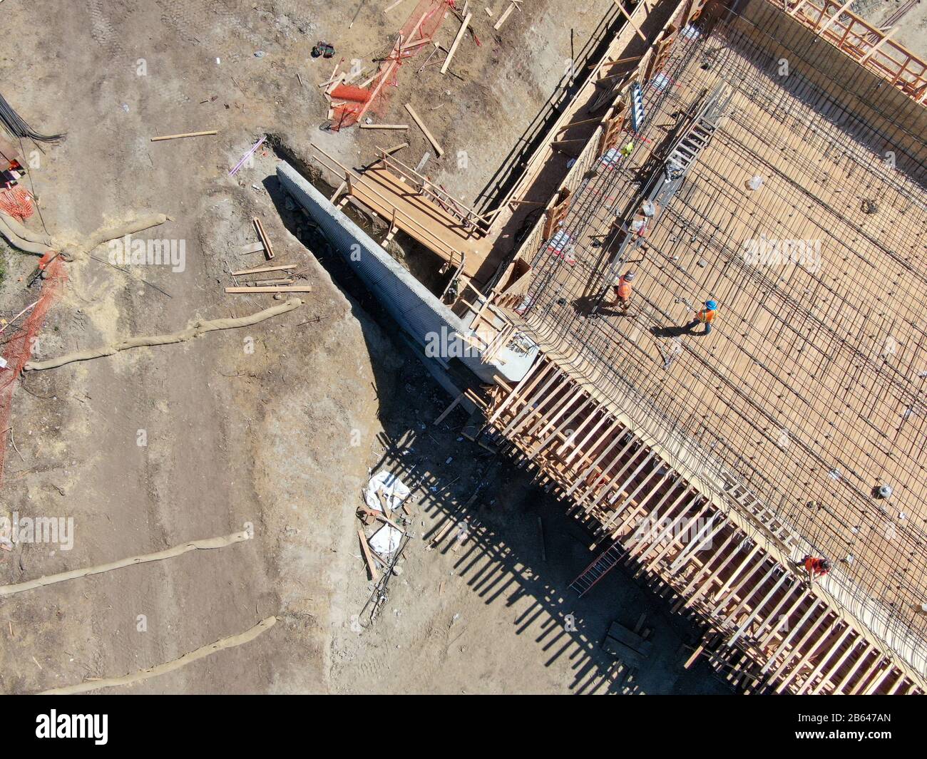 Aerial view of bridge construction crossing the highway, California ...