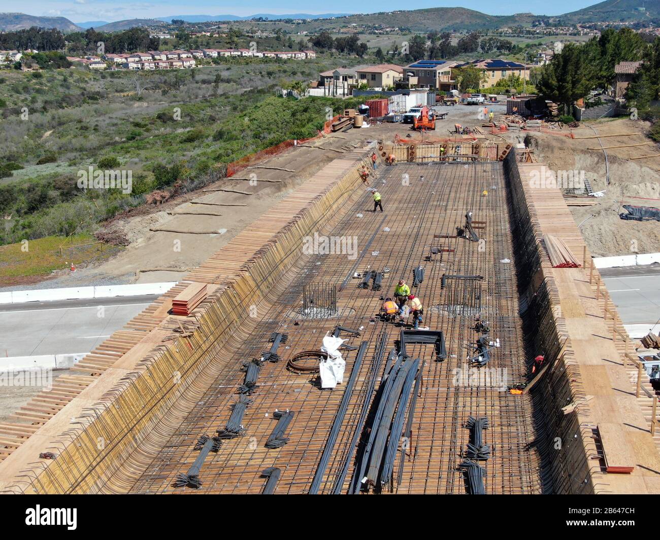 Aerial view of bridge construction crossing the highway, California ...