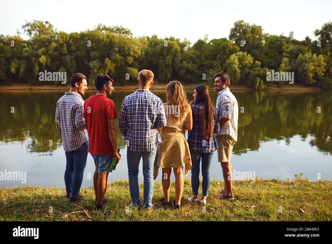 Back view friends beach hi-res stock photography and images - Alamy