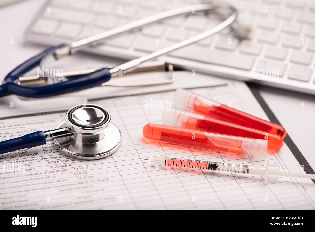 Blood analysis report with lavender color blood sample collection tubes ...