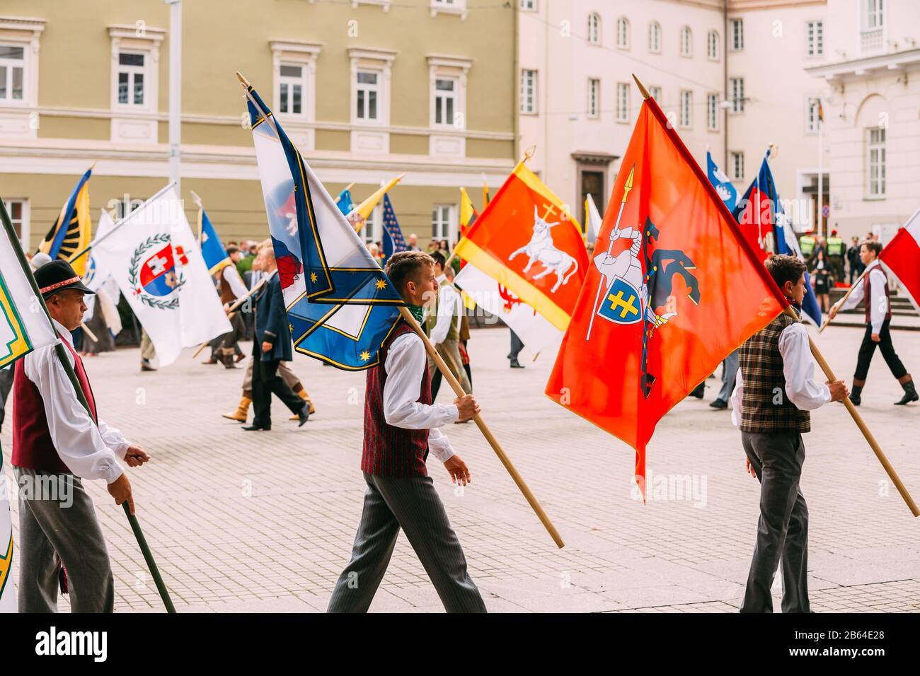 Vilnius, Lithuania. Men Dressed In Traditional Costumes Take Part In ...