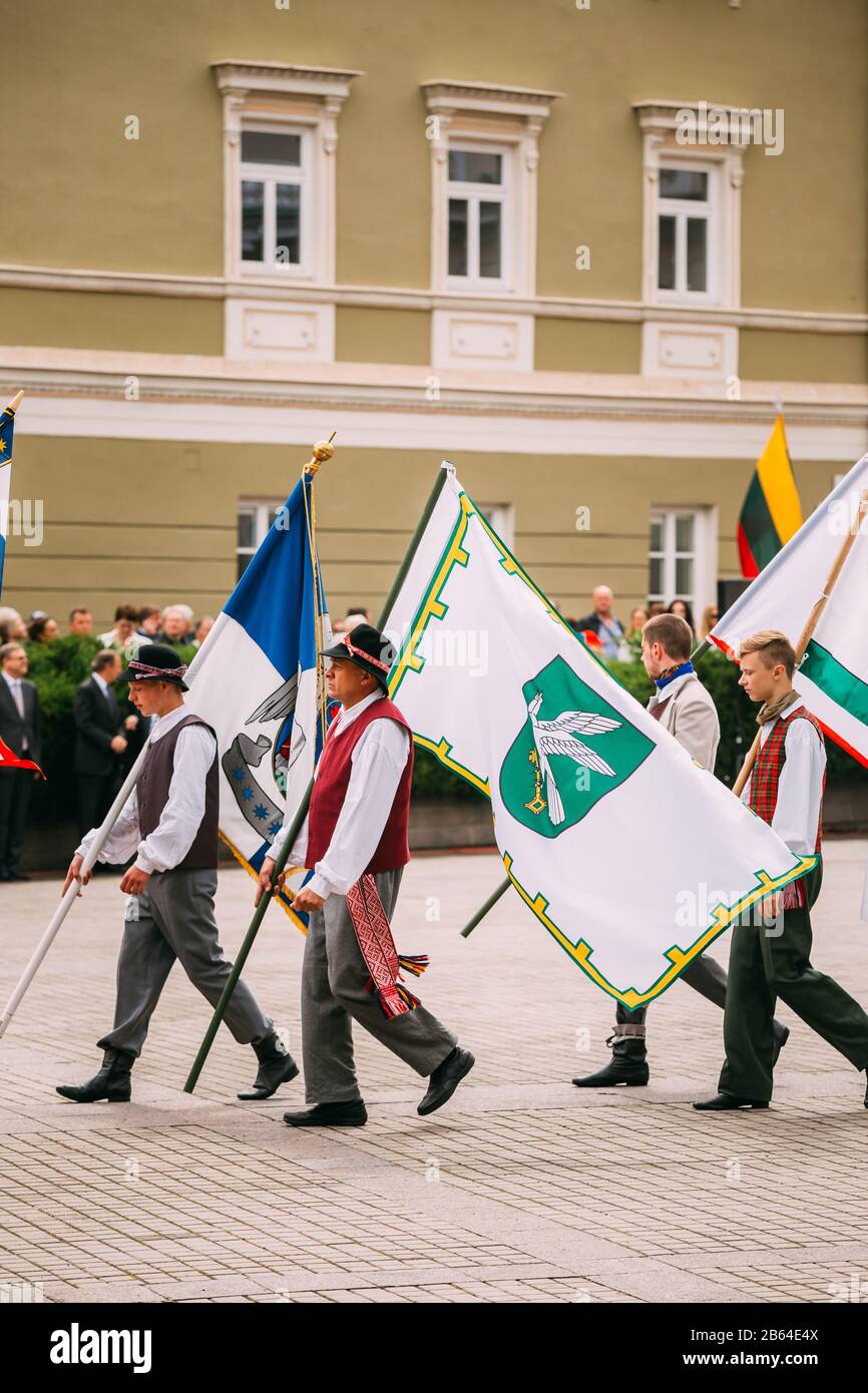Vilnius, Lithuania. Men Dressed In Traditional Costumes Take Part In ...
