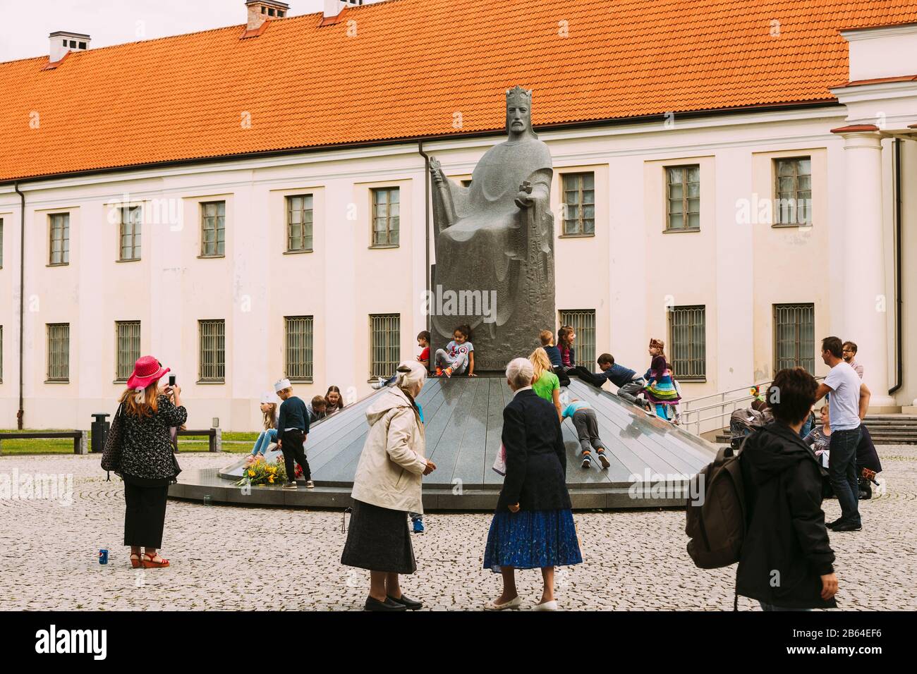 Vilnius, Lithuania. People Walking Near Monument To King Mindaugas Near ...
