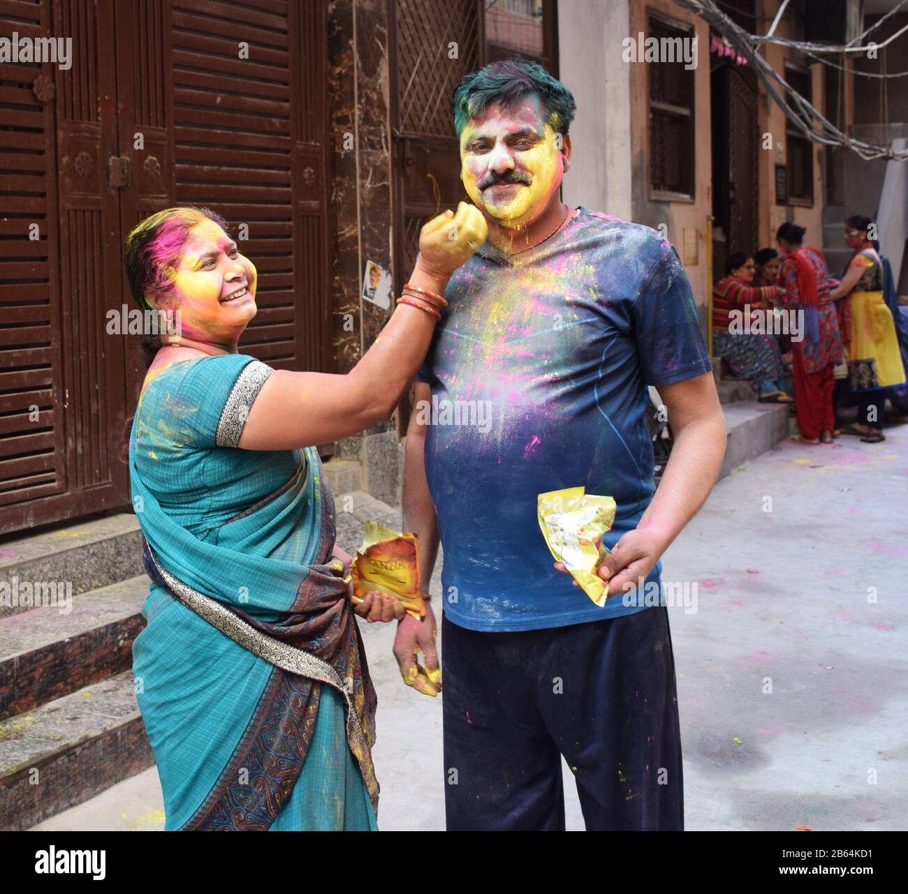 Indian people playing Holi in India Stock Photo - Alamy