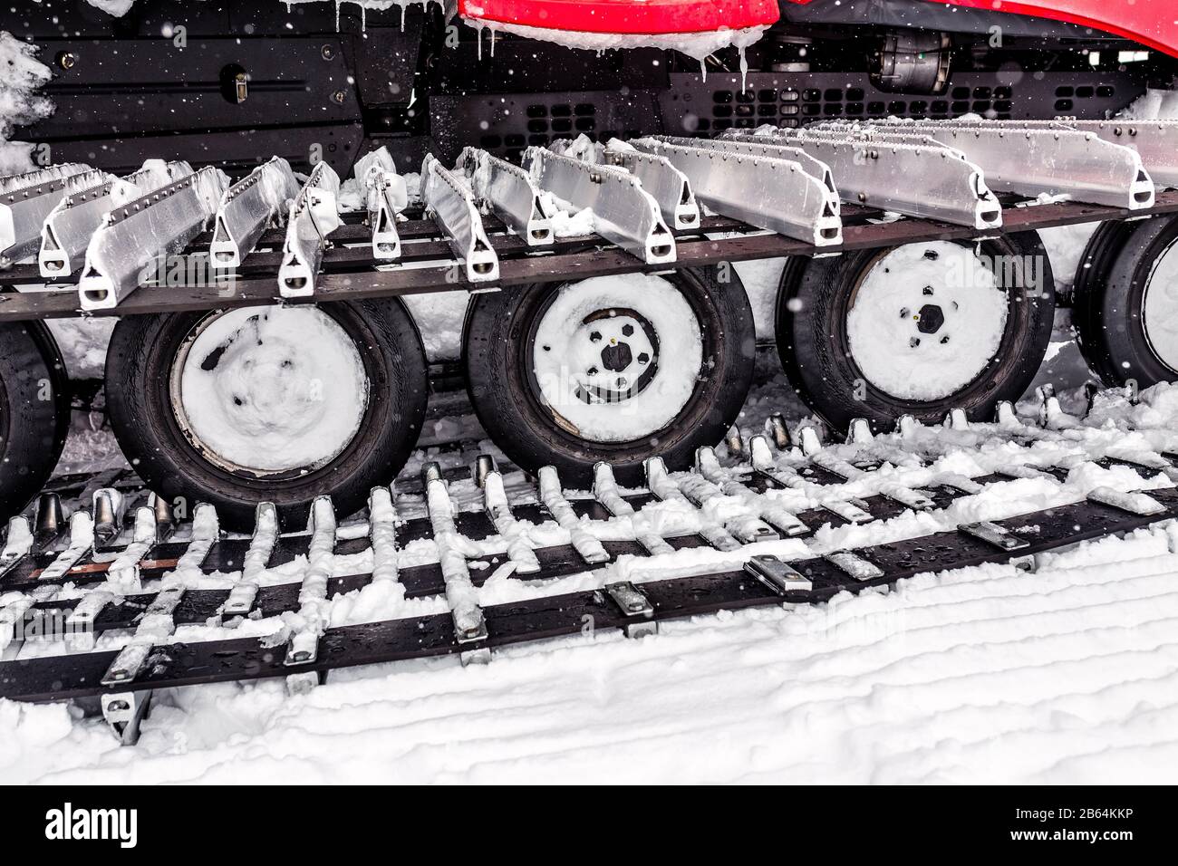snowcat detail at winter snow storm, caterpillar and wheel detail Stock ...