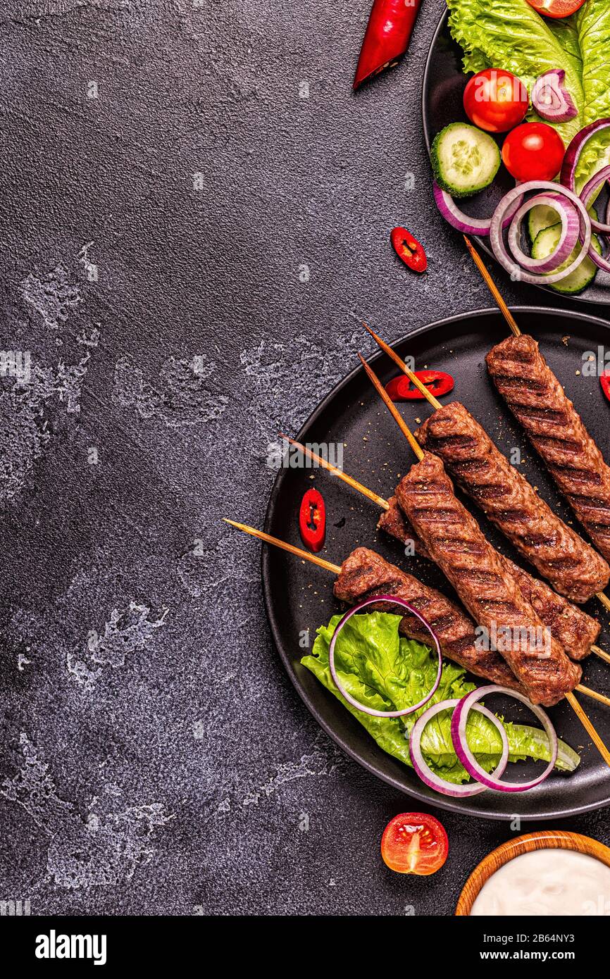 Traditional middle eastern, arabic or mediterranean meat kebab with ...
